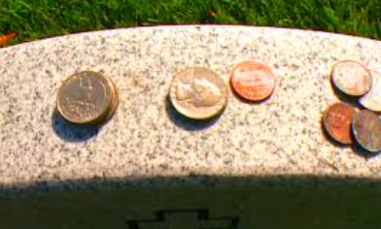 I never knew the purpose of leaving coins on gravestones – here’s what ...